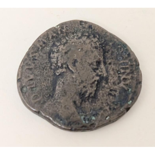 Roman Bronze Coin with bearded head facing to right, reverse with ...
