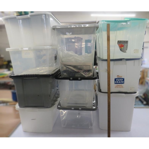 10 plastic storage boxes of differing size, all with lids