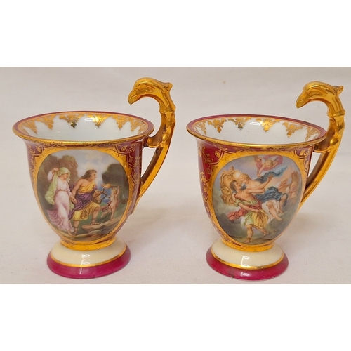 Pair Royal Vienna Cabinet Cups, deep red ground, gilded with panels of ...