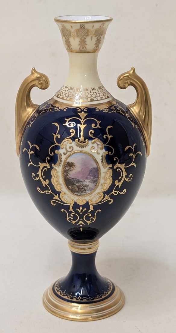 Coalport Porcelain Twin Handled Vase, blue ground, extensive gilding ...