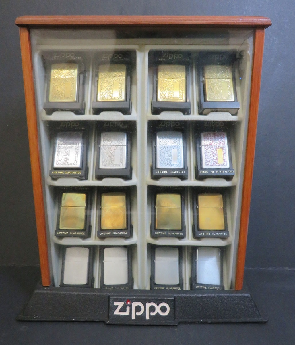 16 Zippo Lighters in wooden & plastic based display case, with key ...