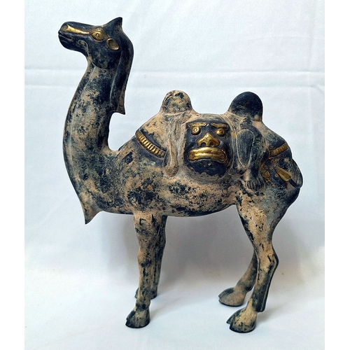 Oriental Metal Camel decorated with masks to each side of saddle, all ...