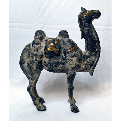 Oriental Metal Camel decorated with masks to each side of saddle, all ...