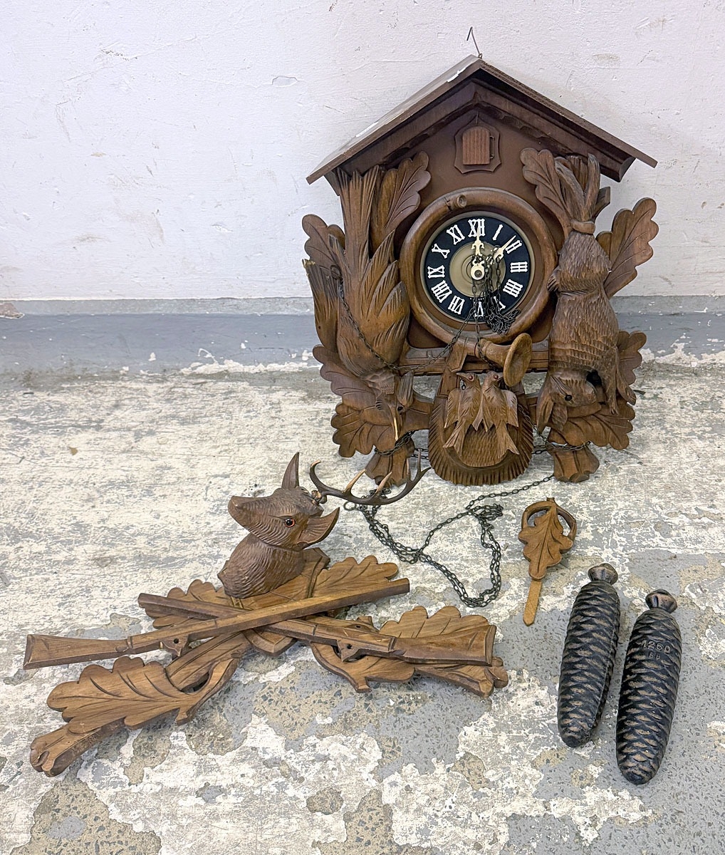 West German 8 Day Carved Wooden Cuckoo Clock with acorn weights (a/f ...