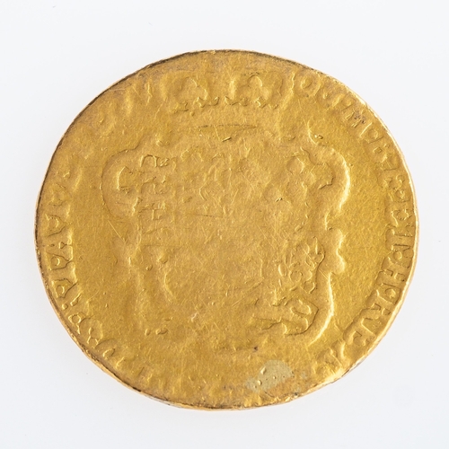 A George III sovereign coin, weight 7.8 grams