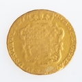 A George III sovereign coin, weight 7.8 grams