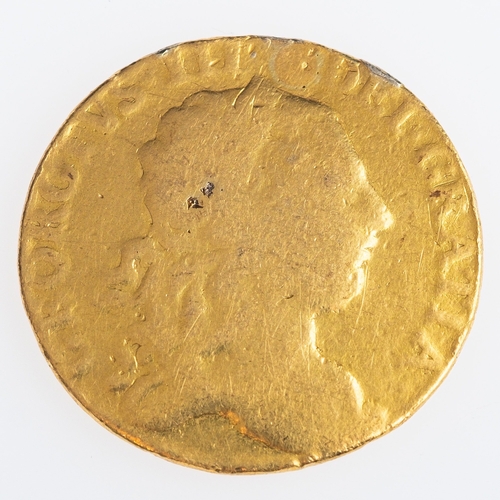 A George III sovereign coin, weight 7.8 grams