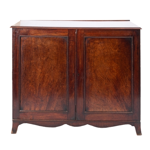 A Regency mahogany press cupboard, circa 1815; the top with moulded ...