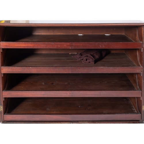 A Regency mahogany press cupboard, circa 1815; the top with moulded ...