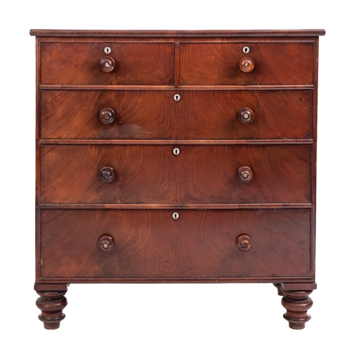 A Victorian mahogany chest of drawers, mid 19th Century; the two short ...