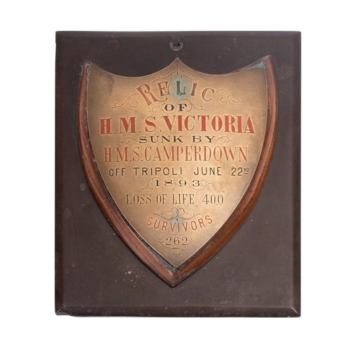 A teak and brass commemorative shield plaque for the Royal Navy ...