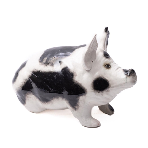 A large Wemyss Ware pottery pig painted and sponged in black and grey ...
