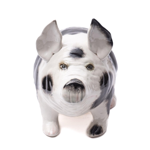 A large Wemyss Ware pottery pig painted and sponged in black and grey ...