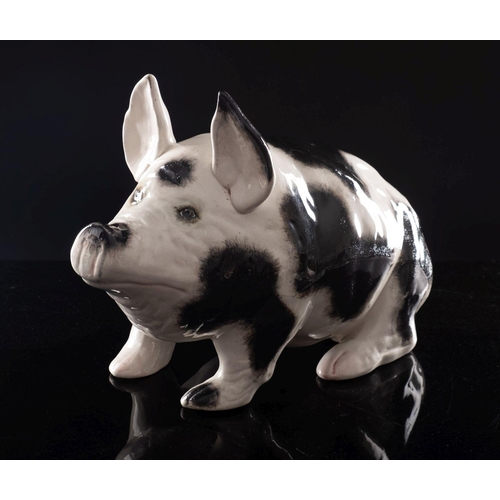 A large Wemyss Ware pottery pig painted and sponged in black and grey ...