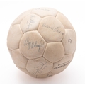 A 1972/73 Manchester United autographed football. Signatures include ...