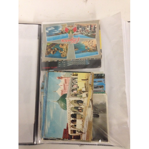 An album of stamps, postcards, beer mats and other ephemera.