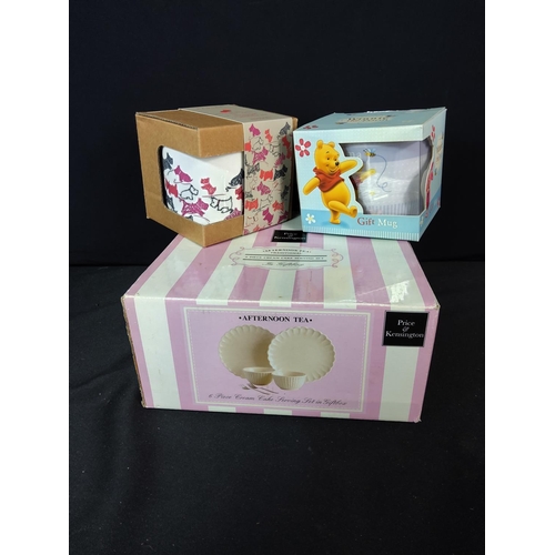 3 boxed items including a Radley mug and a box of china and glassware