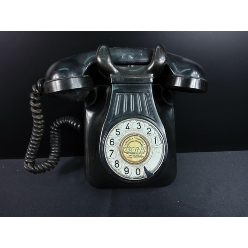 Vintage wall mounted Bakelite phone