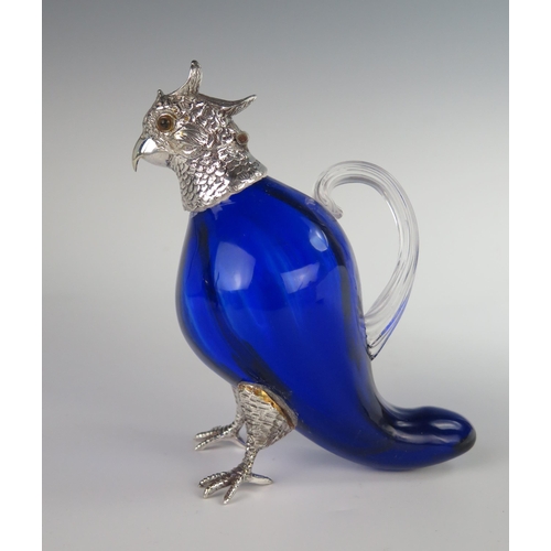 A Blue Glass And Electroplated Silver Bird Decanter, the hinged head ...