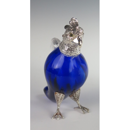 A Blue Glass And Electroplated Silver Bird Decanter, the hinged head ...