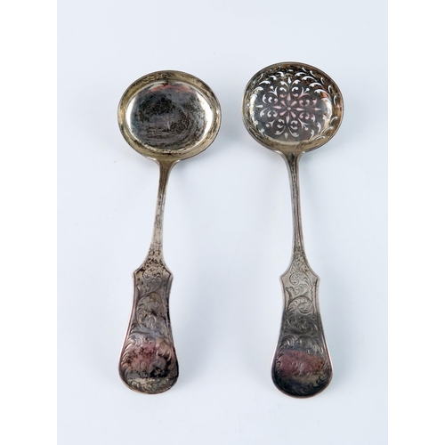 A Victorian provincial silver sifting spoon and matching sauce ladle ...