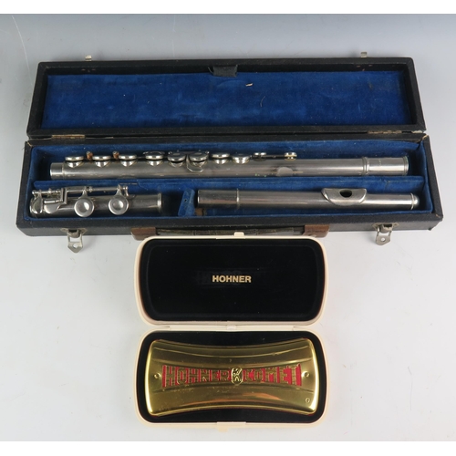 J R Lafleur & Son Ltd a three piece chromed flute contained in a fitted ...