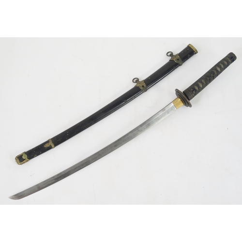 A Japanese katana, with 63cm signed blade, with plain oval tsuba, fish ...
