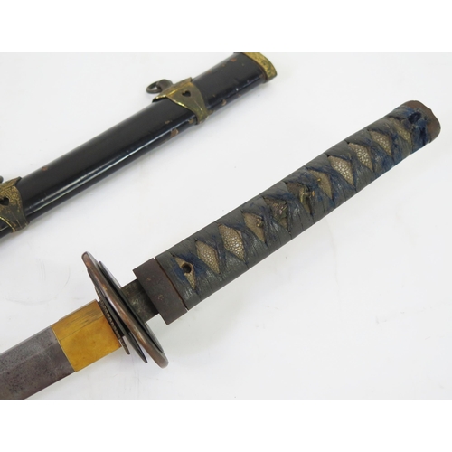 A Japanese katana, with 63cm signed blade, with plain oval tsuba, fish ...