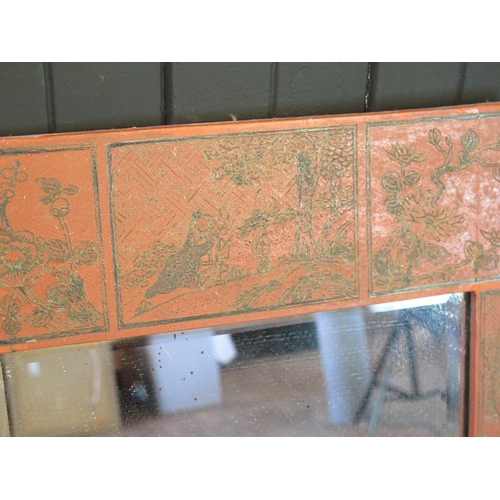 A Chinese wall mirror, the rectangular mirror plated enclosed within a ...