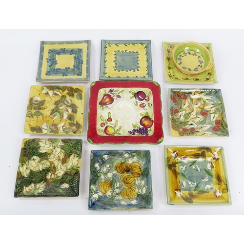 Eight square pottery dinner plates each individually designed, 27cm ...