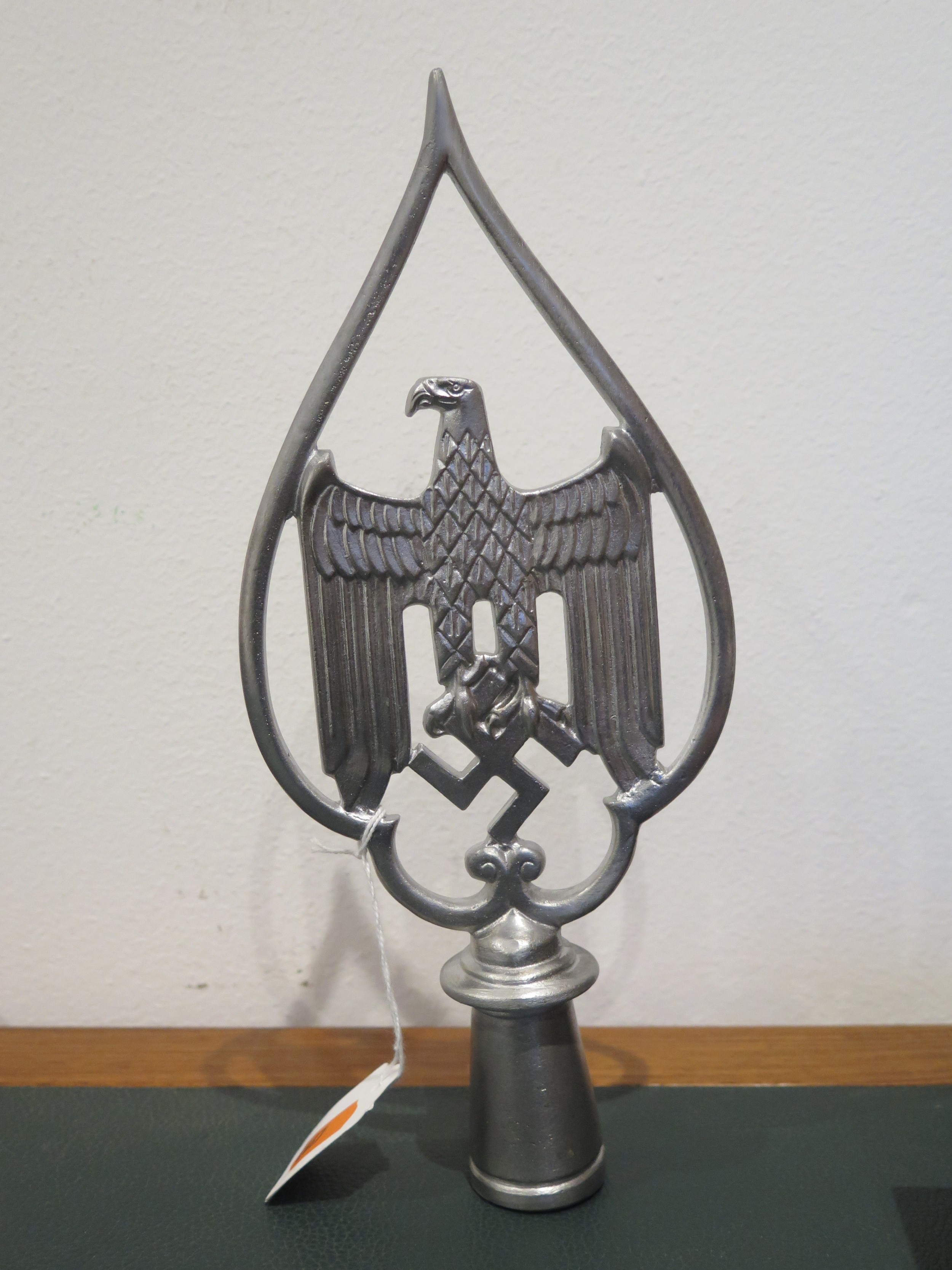 A Reproduction Third Reich period alloy standard finial, the national ...