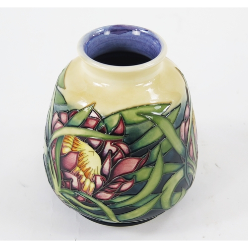 A Moorcroft pottery vase, with 'Ptotea' design decoration to a design ...