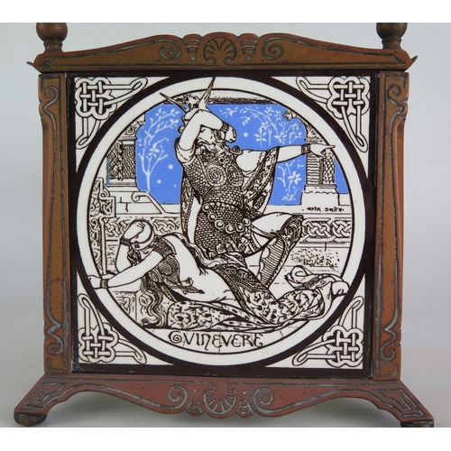 A Victorian metal plant holder with sides decorated with Minton tiles ...