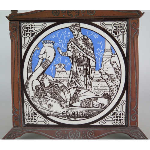 A Victorian metal plant holder with sides decorated with Minton tiles ...