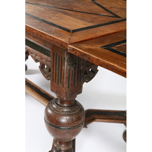 A 17TH CENTURY OAK AND EBONY DRAW-LEAF TABLE, DUTCH, CIRCA 1660. The ...