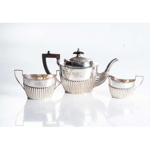 A THREE-PIECE SILVER TEA SET Williams (Birmingham) Ltd., Birmingham ...