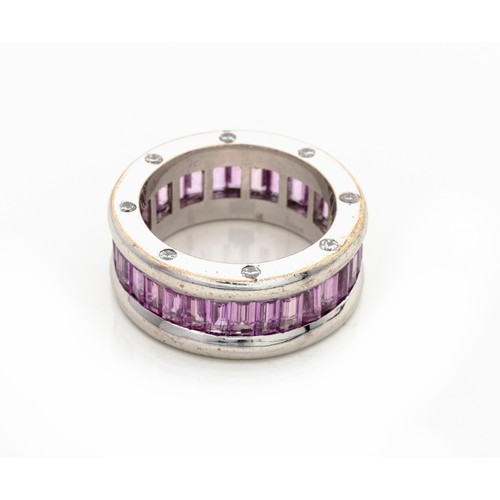 A PINK SAPPHIRE AND DIAMOND ETERNITY RING