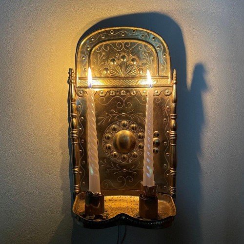 A PAIR OF DUTCH BRASS REPOUSSÉ WALL SCONCES, CIRCA 1700