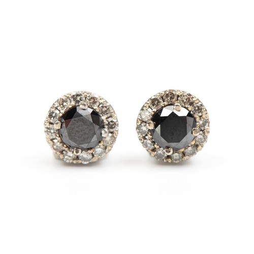 A PAIR OF NATURAL DIAMOND HALO EARRINGS