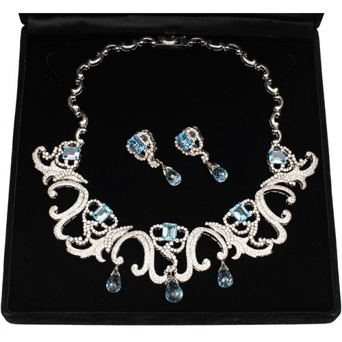 A SUITE OF NATURAL DIAMOND AND TOPAZ JEWELLERY, FLORENCE ITALY 2000