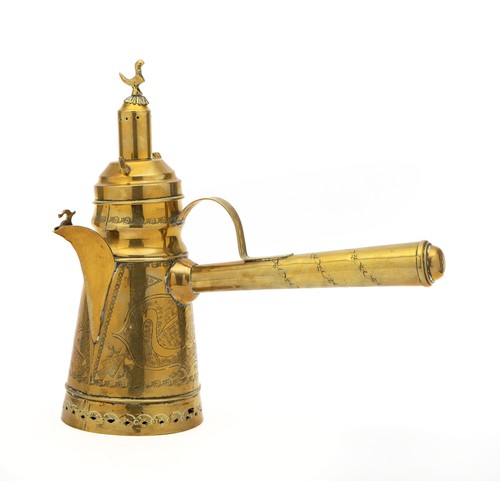 A BRASS DALLAH COFFEE POT