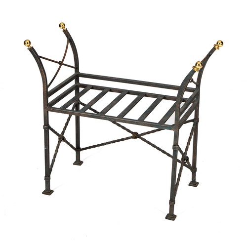 A WROUGHT IRON BENCH FRAME