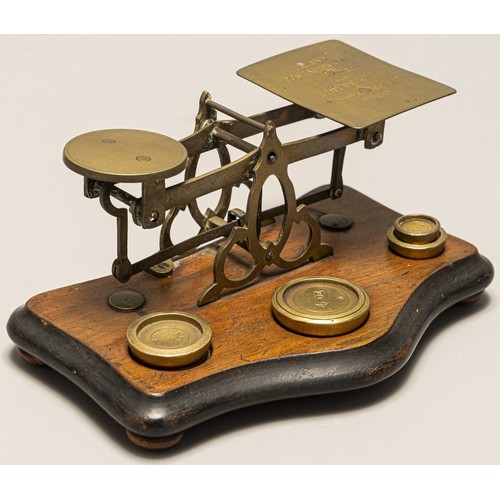 A BRASS POSTAL SCALE