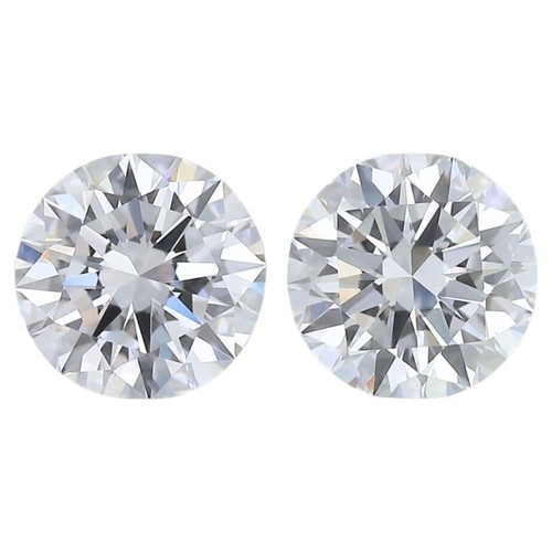 A PAIR OF NATURAL UNSET DIAMONDS, 1.151 CARATS
