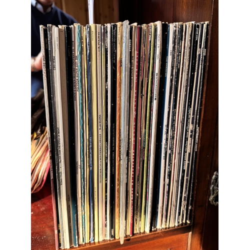 A collection of LPs and 45s