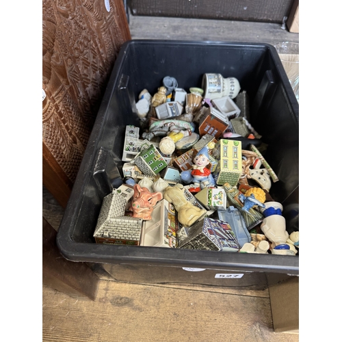 A box of assorted Wade miniature models and figures