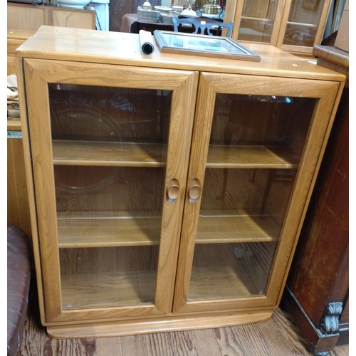 Two Ercol display units. 20th century.