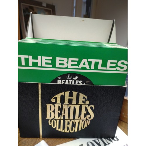 The Beatles memorabilia including: The Beatles Collection 24 singles ...