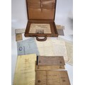 A vintage tan briefcase containing Lloyds Bank cheque books dating mid ...
