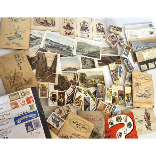 Four embroidered WWI postcards, twenty-five vintage postcards, and a ...